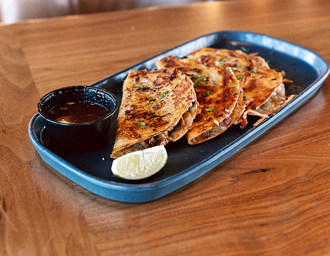 These aren't just tacos; they're edible love letters. Crispy, savory perfection served with that crucial lime wedge for that bright finish.