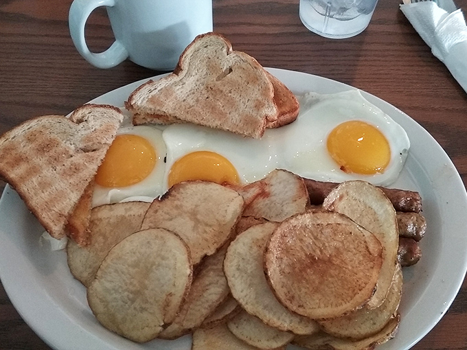 Breakfast perfection doesn't need fancy plating&mdash;just perfectly sunny-side-up eggs, home fries with that ideal crisp, and toast waiting for its butter bath.