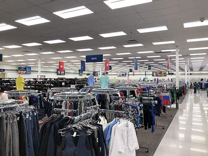 The boys' section organizes chaos into color-coded dreams, where superhero shirts meet Sunday best blazers.