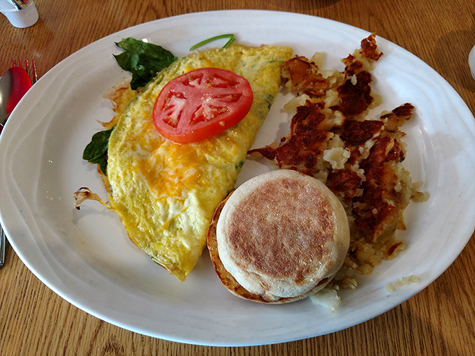 A perfect omelet with just the right amount of cheese, paired with crispy home fries and an English muffin. Breakfast doesn't need to be complicated to be extraordinary.
