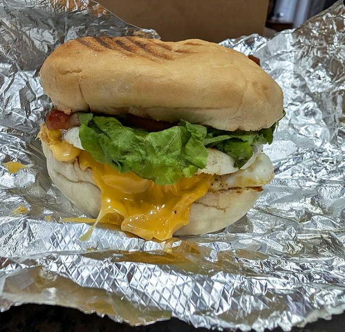 Behold the breakfast sandwich in its natural habitat: perfectly toasted bread, melty cheese, and an egg that's having its best day ever.