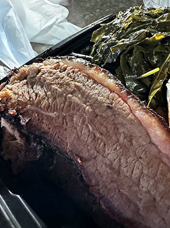 Brisket with a bark so perfect it deserves its own standing ovation. That smoke ring is the barbecue equivalent of a Michelin star.