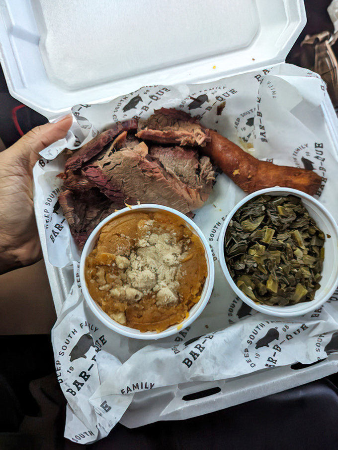 Behold the holy trinity: tender brisket, smoky sausage, and sides that steal the show.