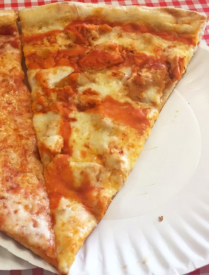 Buffalo chicken pizza that makes time stand still—tangy sauce, tender chicken, and that perfect cheese pull that dreams are made of.