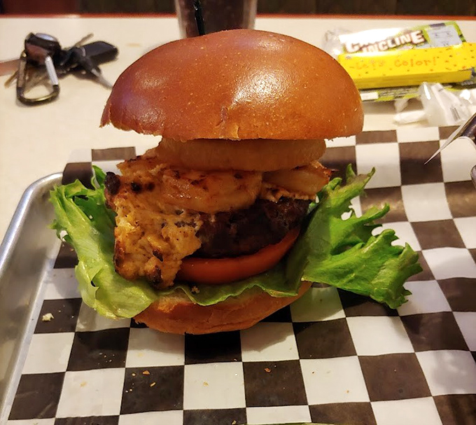 Not all burger heroes wear capes. This one wears a perfectly toasted bun and enough toppings to make you forget your table manners.