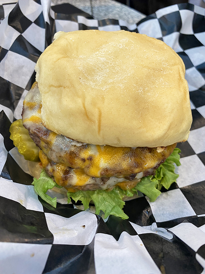 This isn't just a cheeseburger&mdash;it's edible architecture. The melted cheese cascades down like a yellow waterfall of happiness.
