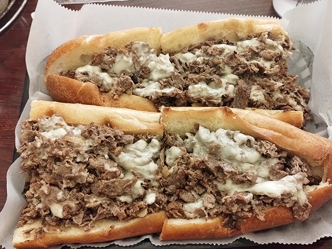 These cheesesteaks aren't just sandwiches; they're architectural marvels of tender meat and melted cheese that would make Philadelphia jealous.