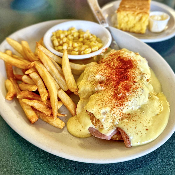 Eggs Benedict doesn't wear a disguise here&mdash;it shows up in all its golden-sauced glory, with crispy fries standing guard.