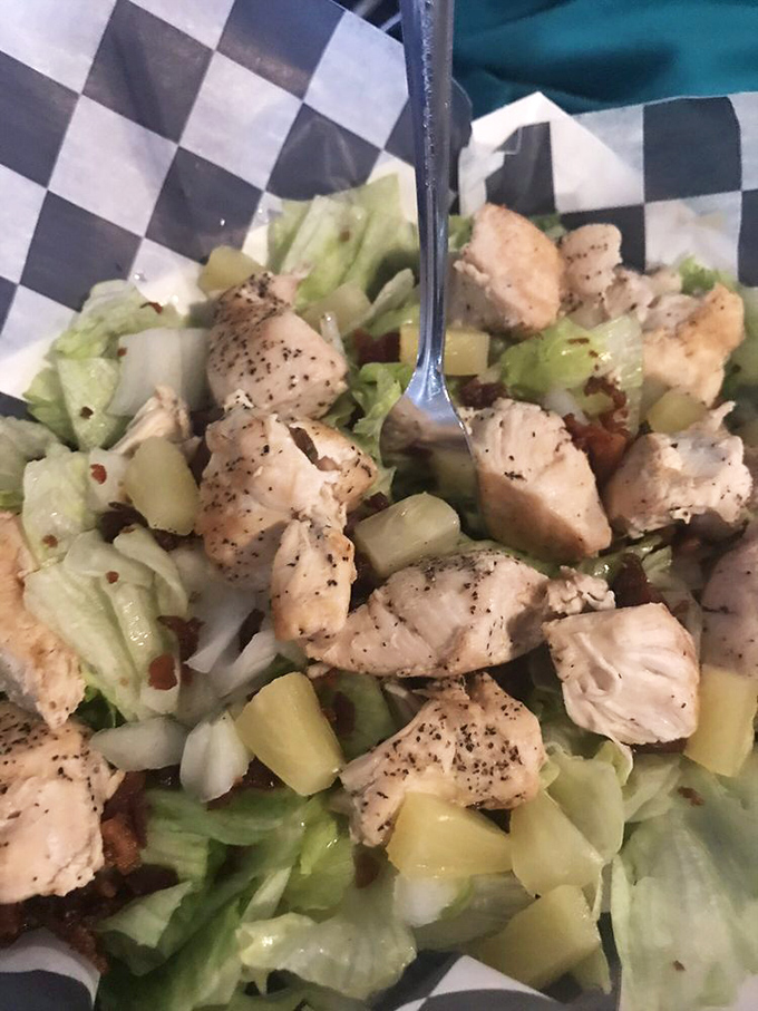 Fresh, tender chicken chunks nestled among crisp vegetables&mdash;proof that sometimes salads aren't just what food eats before becoming food.