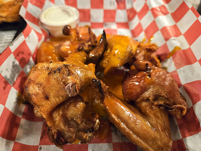 These chicken wings aren't just cooked—they're transformed into golden-brown messengers of joy that demand to be devoured.