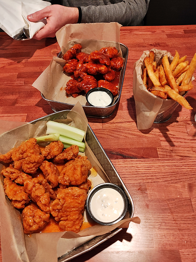 Wing perfection comes in two flavors at Max's. Crispy, saucy, and served with the kind of fries that make you forget your table manners.