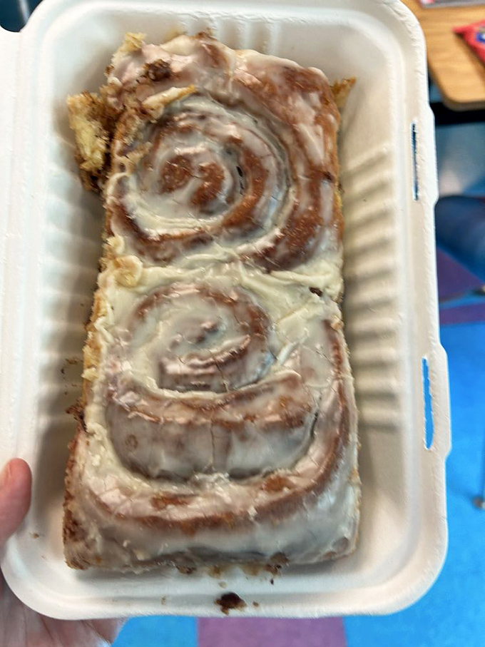 These aren't just cinnamon rolls; they're spiral-shaped proof that sometimes the universe wants you to be happy. The glaze alone deserves its own fan club.