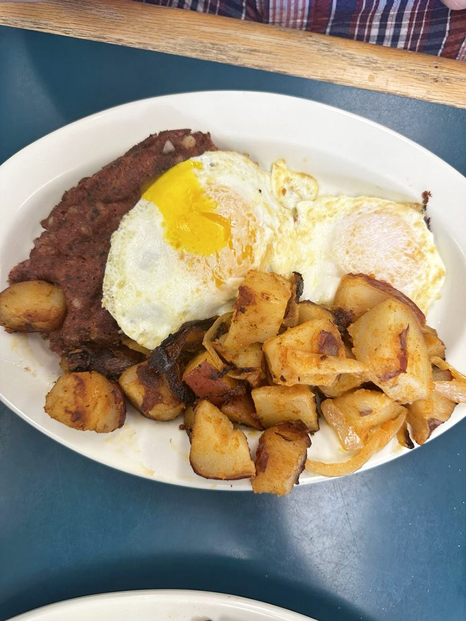 Corned beef and eggs that would make your bubbe proud. Those home fries aren't just browned – they're caramelized to the edge of perfection.