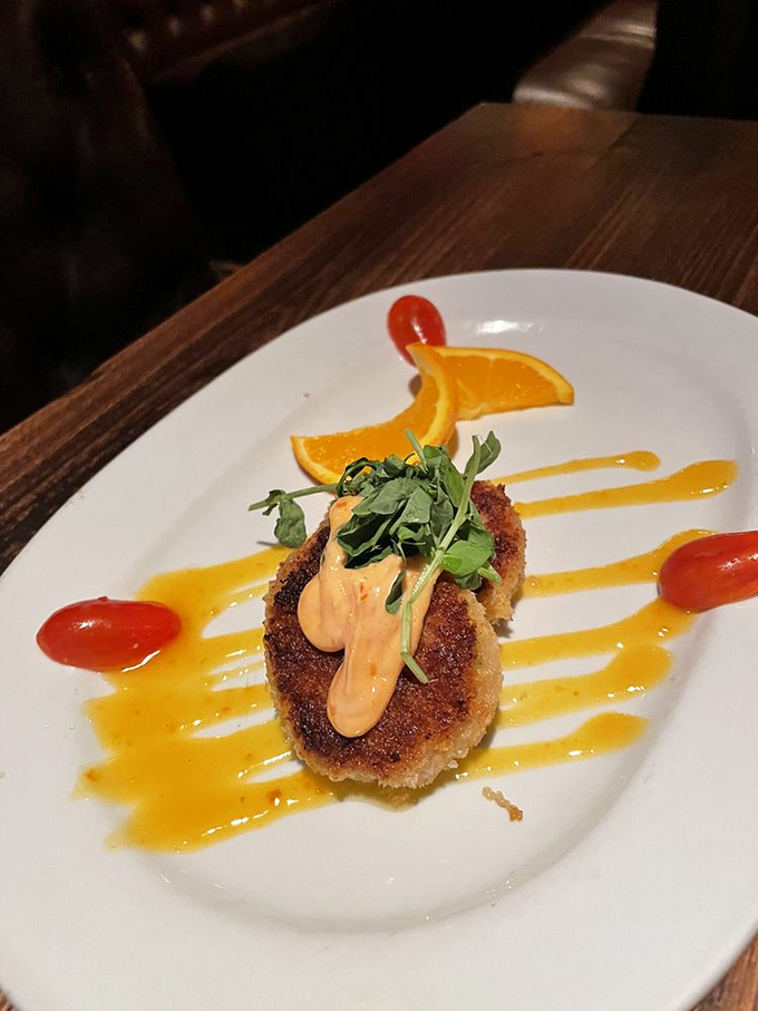 This crab cake arrives dressed to impress &ndash; golden, gorgeous, and ready for its close-up moment.