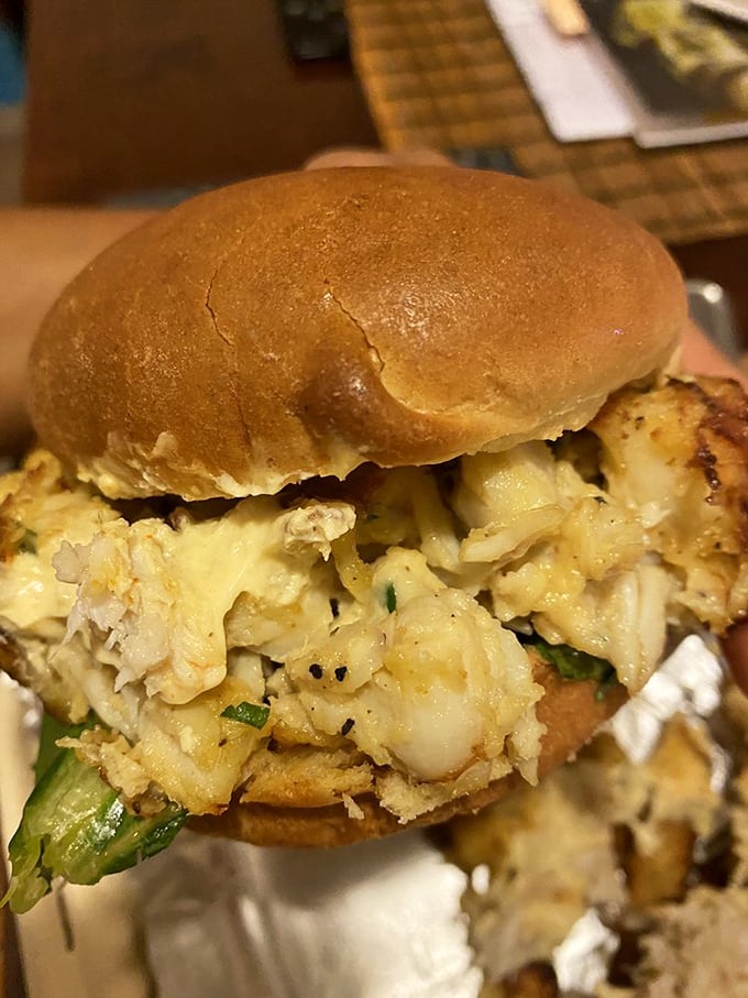 Behold the sandwich that launches a thousand road trips. This crab cake masterpiece contains so little filler, it seems held together by seafood sorcery.
