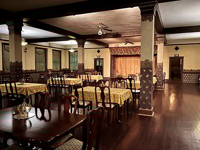 Elegant dining tables await guests for murder mystery dinners, where the only thing more delicious than the food is solving the evening's crime.