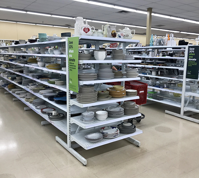 Plates, bowls, and serving pieces stacked with possibility. Someone's forgotten china could become the star of your next dinner party.