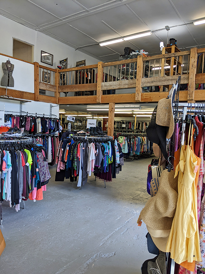 The store's multi-level layout creates shopping neighborhoods within one space. That "Youth" sign promises hand-me-downs that look nothing like hand-me-downs.