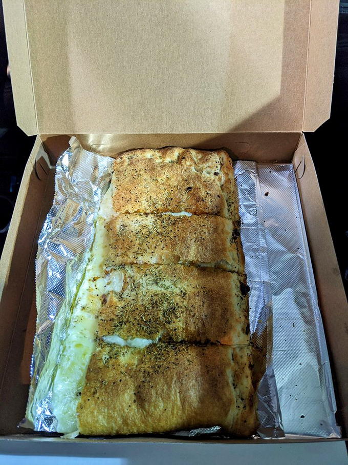 The legendary double-crust white pizza&mdash;a cheese-filled revelation that makes you question everything you thought you knew about pizza. Old Forge style isn't just different, it's transcendent.