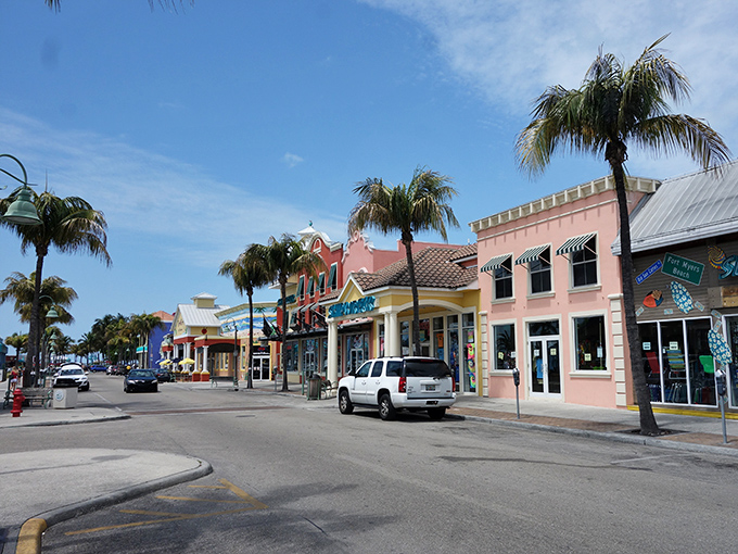 Fort Myers Beach's colorful storefronts create a pastel paradise that feels like someone spilled a rainbow into their architectural plans&mdash;delightfully so.