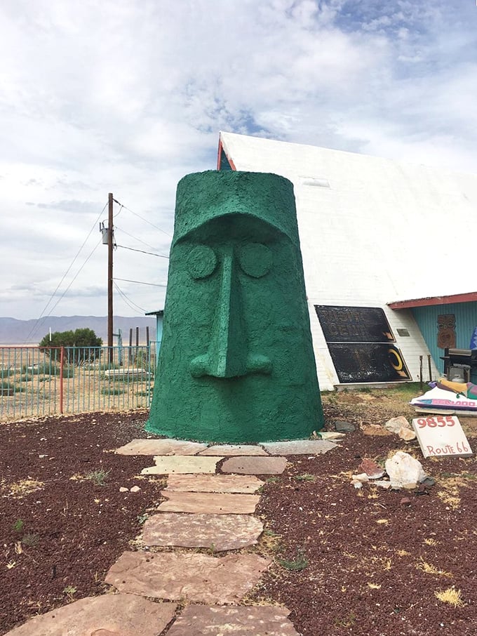 Like a stern librarian of the desert, Giganticus Headicus watches over the landscape with an expression that says, "I've seen it all, traveler."