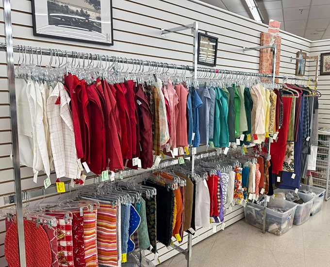 Color-coded clothing racks that would make Marie Kondo weep with joy. Organization this good in a thrift store feels like finding the cheat code to adulting.
