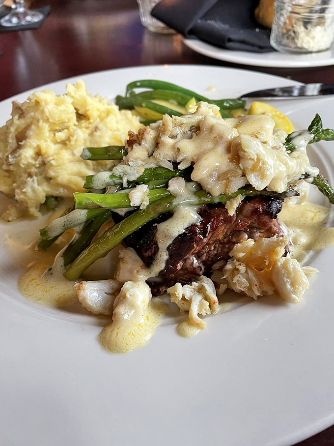 This isn't just dinner; it's edible architecture – a masterpiece of steak, seafood, and sauce that makes you wonder why you ever eat anything else.