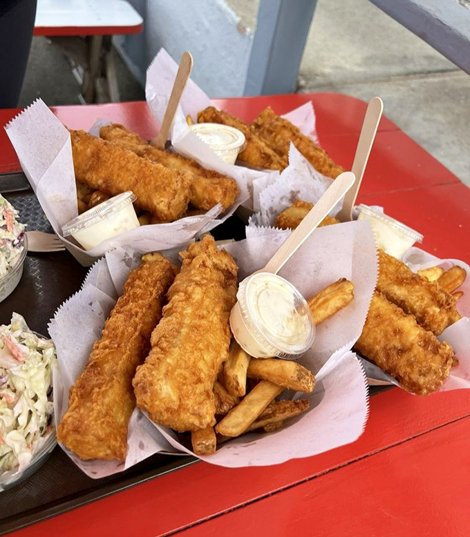 Golden-battered fish and chips that crunch louder than the waves. This is what mermaids would eat on their cheat days.