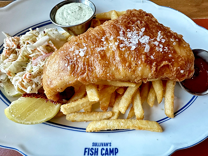 Golden, crispy perfection meets tender, flaky fish in Sullivan's signature dish. This isn't just fish and chips&mdash;it's an edible masterpiece with coleslaw playing the perfect supporting role.