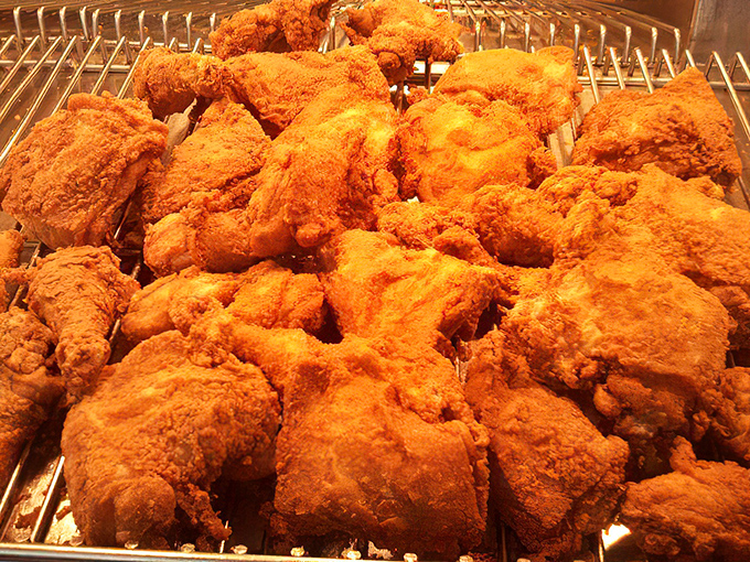 Golden-brown treasures that would make Colonel Sanders weep with envy. This isn't just fried chicken; it's edible art.