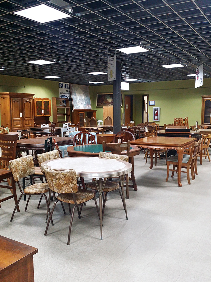 Mid-century modern meets "Grandma's special occasion living room" in this furniture section. That retro dinette set has hosted more family stories than a holiday dinner table.