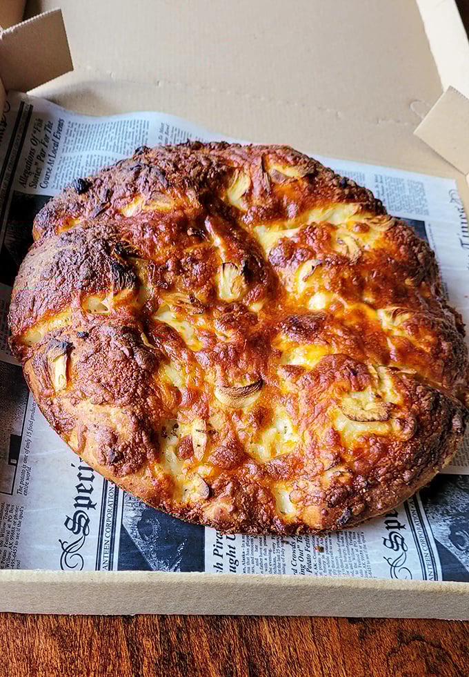 Behold the golden treasures that have achieved legendary status among Akron's most discerning garlic knot connoisseurs.