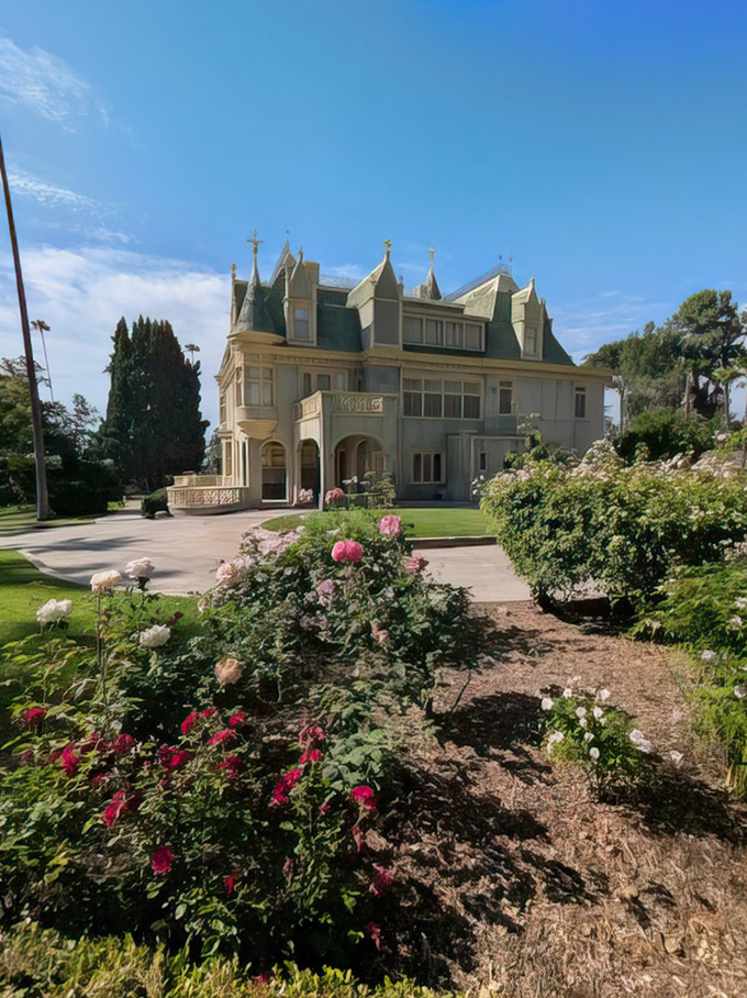 Rose gardens and manicured lawns create the perfect foreground for this architectural confection. Even the flowers seem to be posing for the camera!