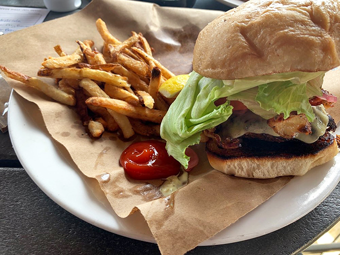 This isn't just a burger&mdash;it's a vacation between two buns. Golden fries and that perfectly toasted bun are just supporting actors.