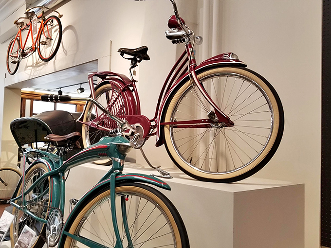 Gleaming with vintage charm, these beautifully preserved bicycles hang like mechanical artwork, showcasing the elegant designs of a bygone era.