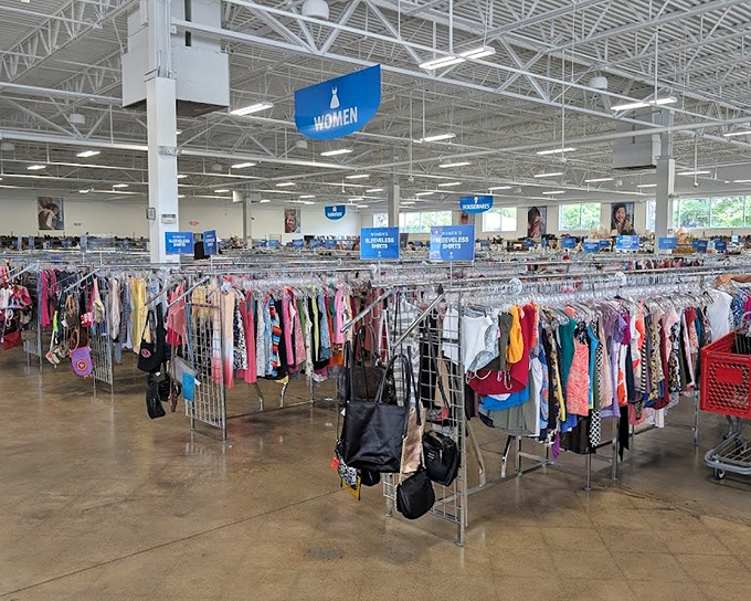 The women's clothing section spans the horizon like a technicolor sea of possibilities, each rack a tiny island of potential style upgrades. 