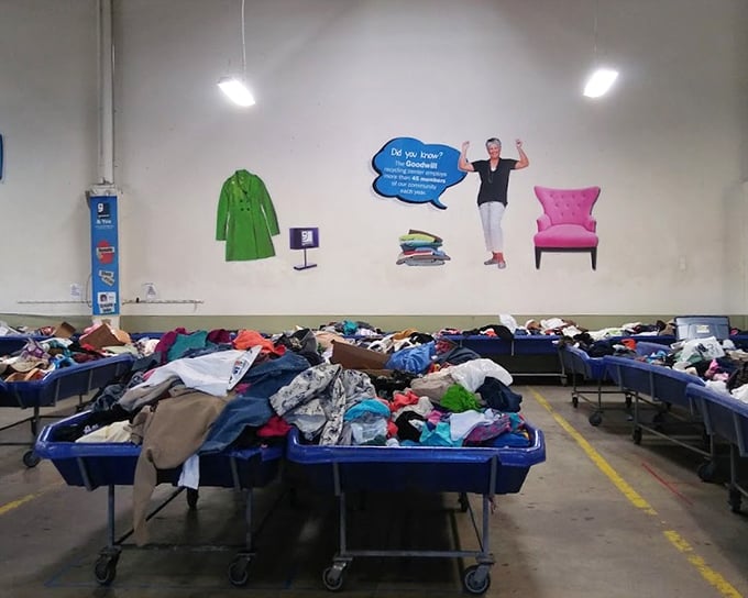 Wall art reminds shoppers of their impact while blue bins stretch to the horizon, each a potential goldmine of possibilities.