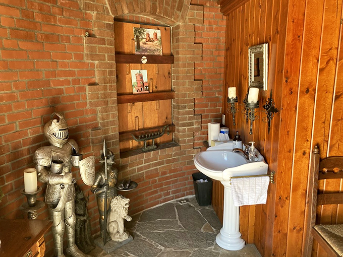 Even knights need a throne room! The bathroom blends medieval charm with modern necessities&mdash;that suit of armor standing guard might make shy bladders a bit nervous.