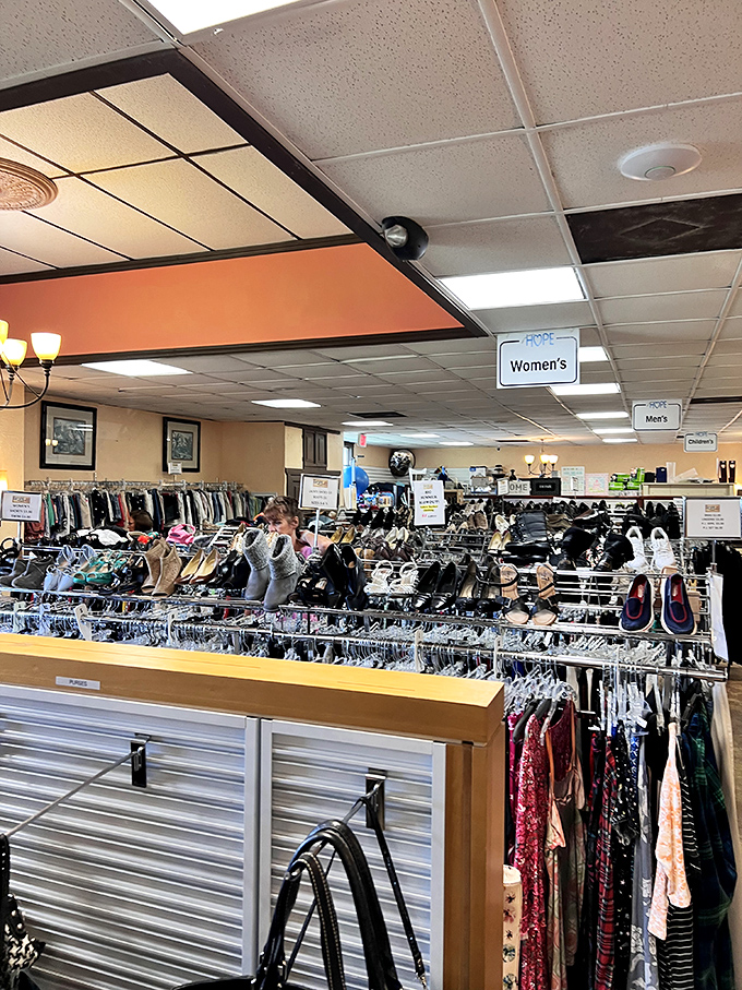 Department store organization meets thrift store prices. Clear signage guides shoppers through this wonderland of pre-loved fashion finds.