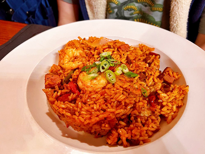 Charleston red rice that doesn't just sit on the plate&mdash;it performs, with plump shrimp and green onions playing supporting roles in this Southern classic.