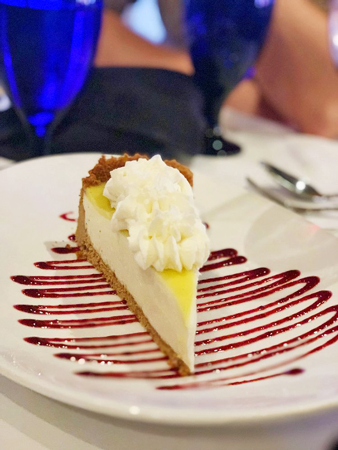 The key lime pie arrives like Florida sunshine on a plate, its perfect sweet-tart balance making you wonder if you've ever actually tasted lime before.
