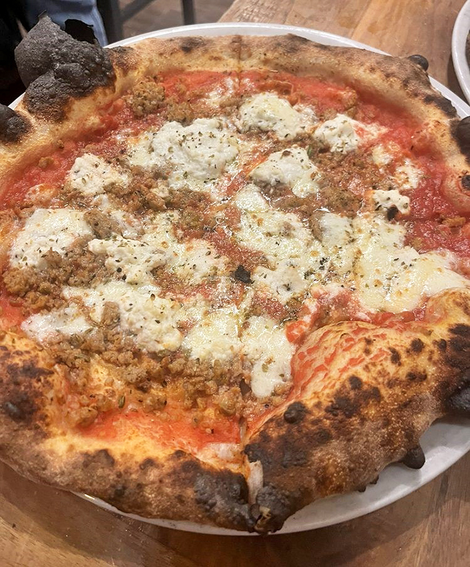 This isn't just pizza&mdash;it's a masterpiece of bubbling cheese, savory toppings, and that perfectly charred Neapolitan crust that dreams are made of.