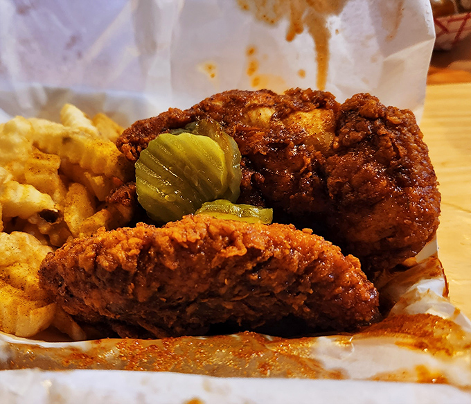 Glistening with that signature red spice oil, this chicken doesn't just look hot&mdash;it's practically radiating warning signals like nature's most dangerous creatures.