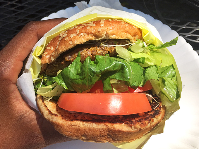 This isn't just a burger; it's architecture with sesame seeds. The perfect stack of fresh ingredients makes fast food chains weep with inadequacy. 