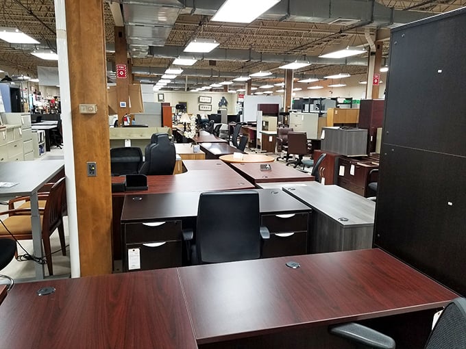 Office furniture paradise or the set of "The Office: Luxury Edition"? Either way, these desks have seen more Monday mornings than most of us care to remember.
