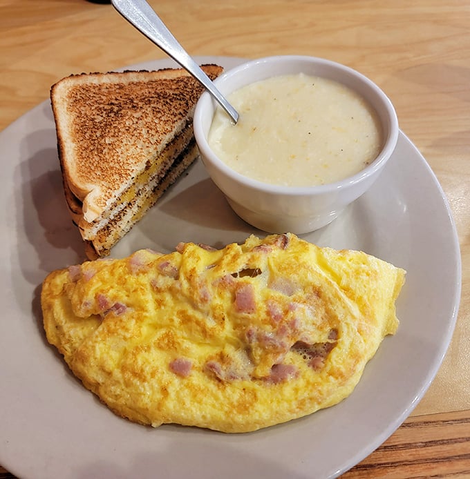 This isn't just an omelet &ndash; it's a fluffy golden pillow of breakfast perfection, paired with toast and soup that complete the comfort trifecta.