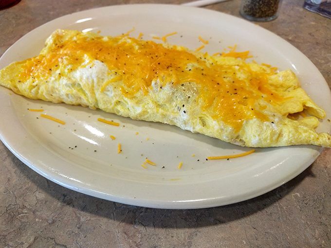 This cheese omelet doesn't need to show off. It's the breakfast equivalent of your most reliable friend—always there, perfectly executed, zero drama.
