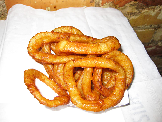 Golden halos of happiness &ndash; these hand-battered onion rings might just be worth crossing state lines for.