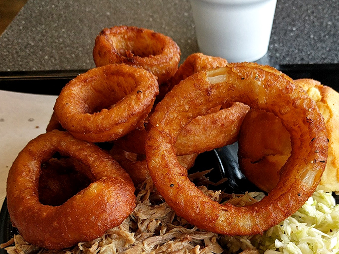 Golden halos of perfection. These aren't just onion rings&mdash;they're crispy, savory crowns that make you question every other onion ring you've ever encountered.