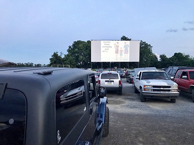 Cars lined up like dominoes, each one a private theater with the best seats in the house.